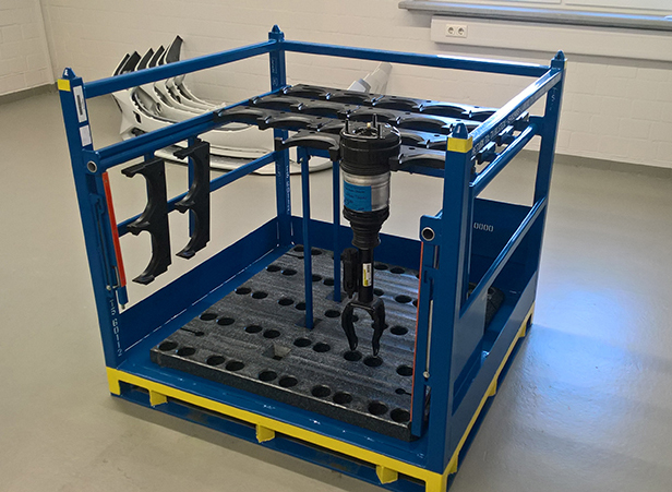 Guías y soportes para racks y contenedores para la industria automotriz